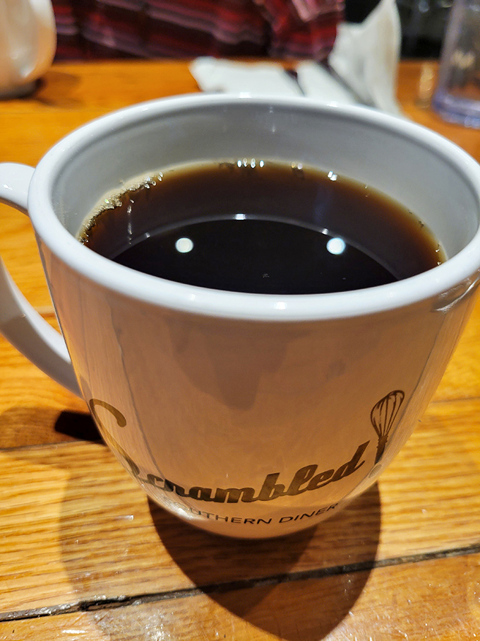 A proper cup of coffee in a branded mug&mdash;because what's the point of exceptional breakfast food without its faithful companion?