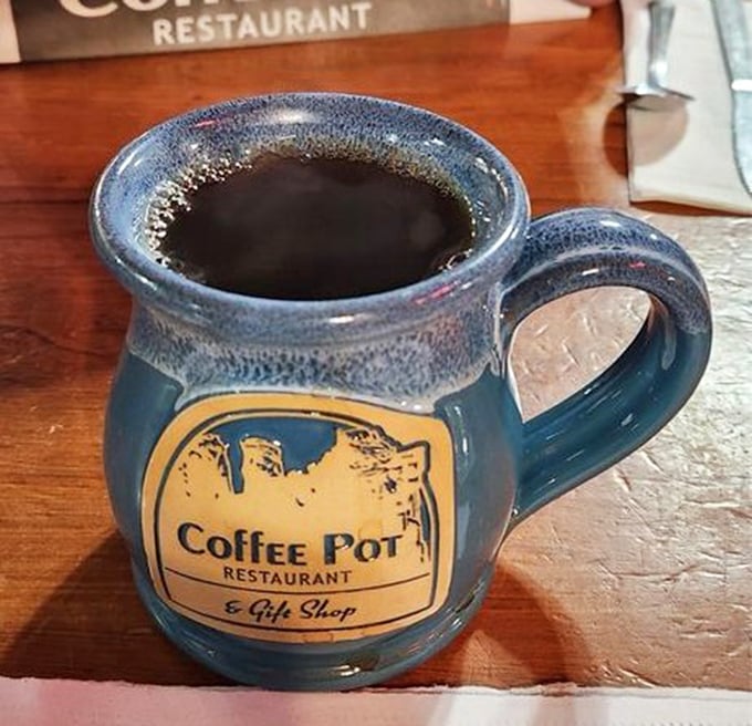 Their signature blue pottery mug isn't just a vessel for coffee &ndash; it's a warm handshake welcoming you to the day ahead.