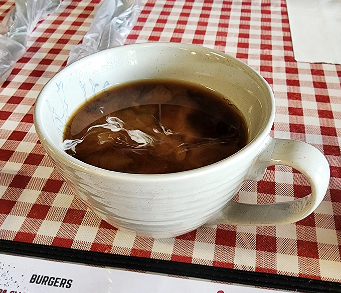 Just a simple cup of coffee, they said. But in a diner like JoJo's, it's liquid optimism served in ceramic—the unofficial sponsor of good mornings.