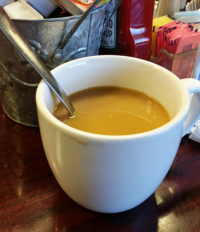 Coffee served in a simple white mug&mdash;proof that sometimes the most profound pleasures come in the most humble vessels.