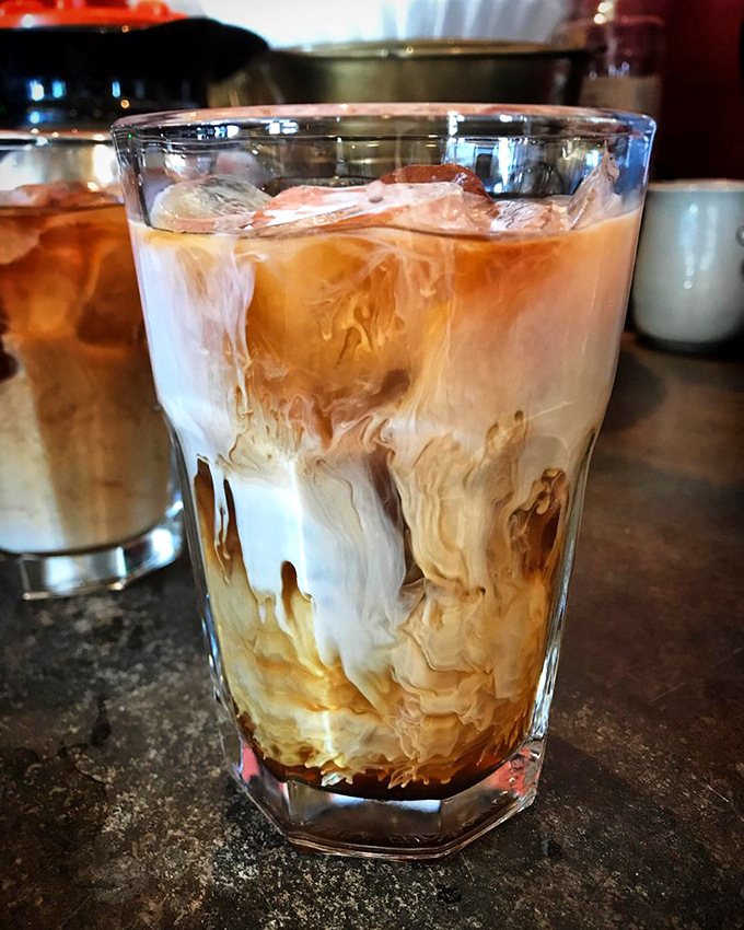 Coffee art you can drink&mdash;cream swirling through cold brew like a caffeinated lava lamp for grown-ups.