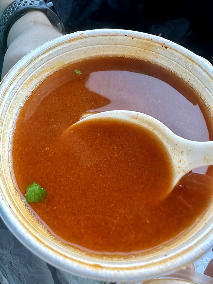 Liquid gold: The consomm&eacute; offers rich, savory depth that could make a vegetarian question their life choices. One spoonful tells a complete story.