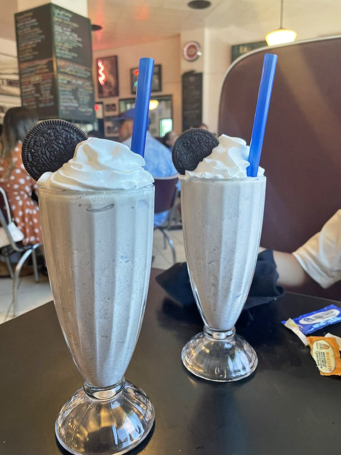 Cookies and cream milkshakes topped with Oreos&mdash;proof that sometimes the best adult beverages don't need alcohol, just a sturdy straw and patience.