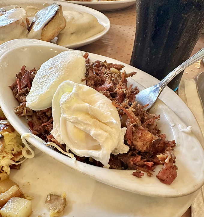 Corned beef hash crowned with poached eggs &ndash; the breakfast equivalent of finding money in your pocket you didn't know was there.