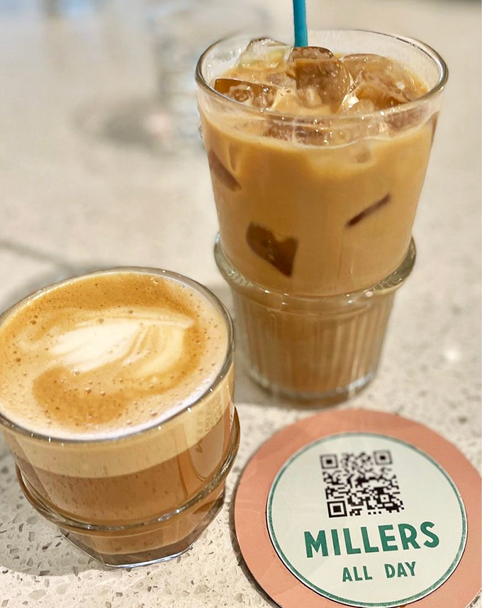 Coffee artistry in full effect: a velvety cortado and caramel latte that make you wonder if your barista moonlights as a Renaissance painter.