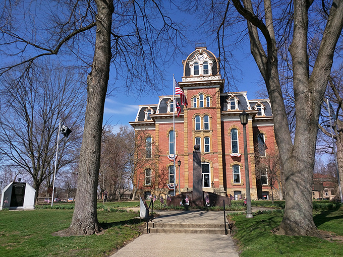 The Coshocton County Courthouse stands proud as a Victorian grande dame, her brick facade telling stories of justice served since horse-and-buggy days.