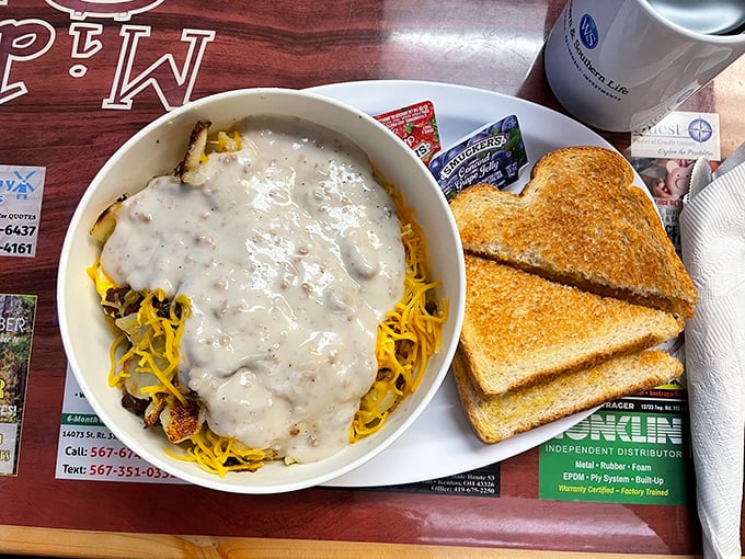 Breakfast in a bowl: where hash browns, eggs, and gravy come together in perfect harmony, like the Beatles of breakfast if the Beatles wore cowboy hats.