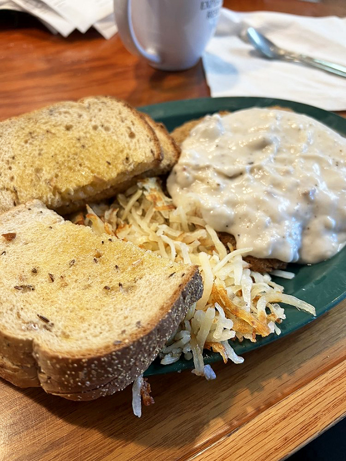 Country fried steak and home fries: the breakfast equivalent of a warm hug from someone who genuinely likes you.