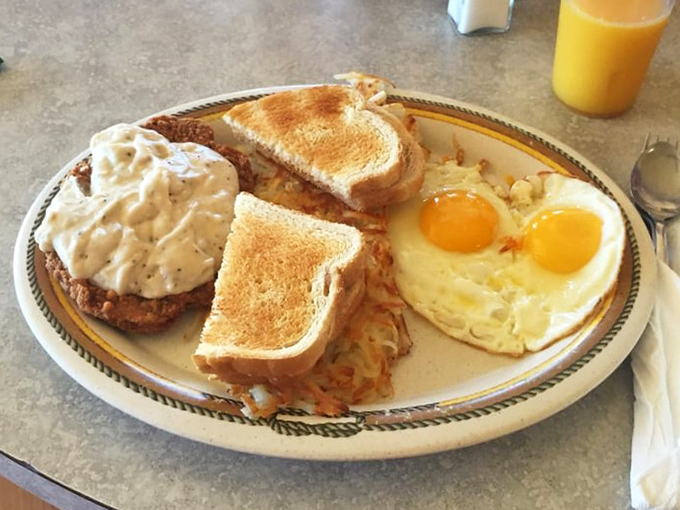 Country-fried steak that could make a vegetarian weep with temptation, paired with eggs sunny enough to brighten anyone's day.