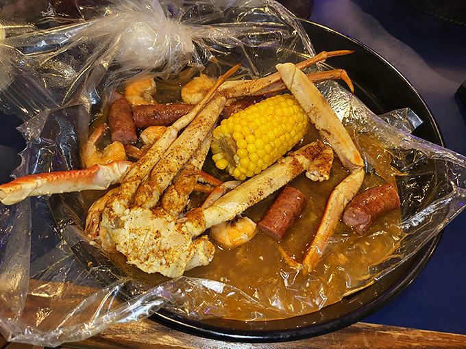 This seafood boil bag isn't just dinner, it's an event &ndash; crab legs reaching skyward like they're celebrating their delicious destiny.