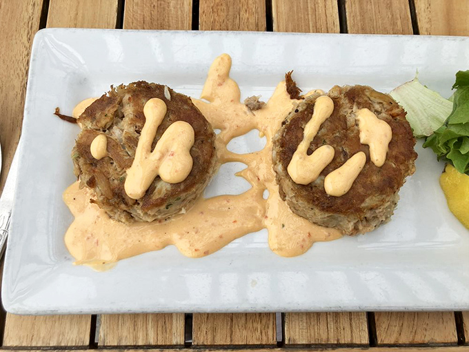 These crab cakes aren't just food&mdash;they're edible art, dressed in a sauce so good you'll be tempted to ask for the recipe. Spoiler: they won't share it.