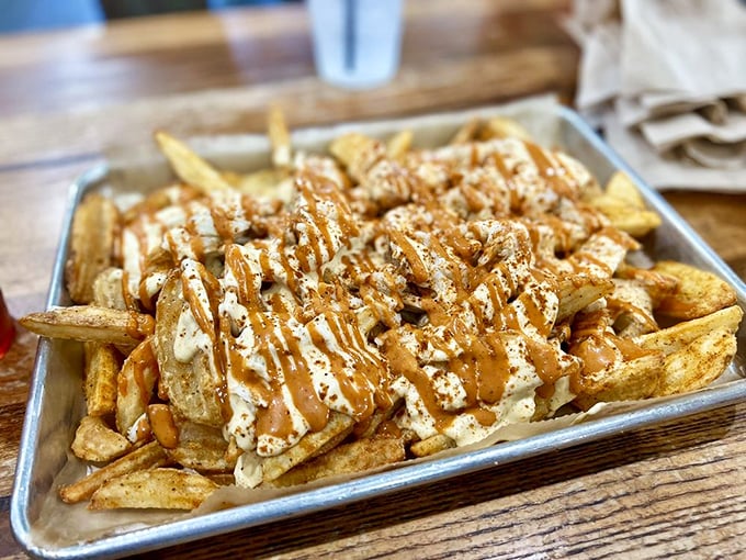 These aren't just fries&mdash;they're a foundation for crab greatness, where Old Bay and creamy sauce transform potatoes into something transcendent.