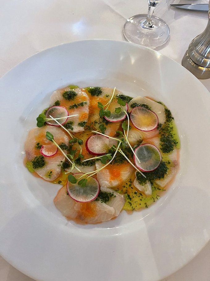 Crudo that looks like modern art and tastes like the ocean's finest gift. Those radish slices add the perfect peppery punctuation.