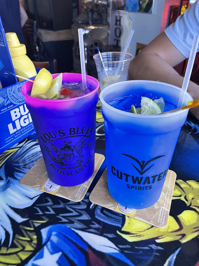 Electric blue drinks that taste like Florida in a cup. When your beverage matches the ocean view, you know you're doing vacation right.