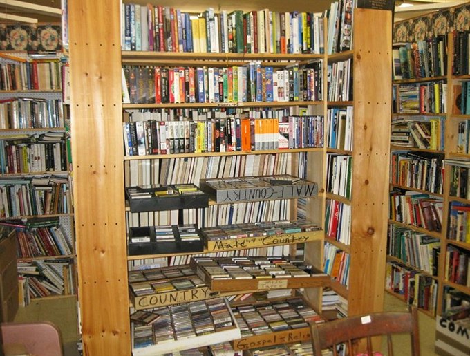Not just books but a library of musical nostalgia. Those neatly labeled "COUNTRY" shelves hold twangy treasures from simpler times.