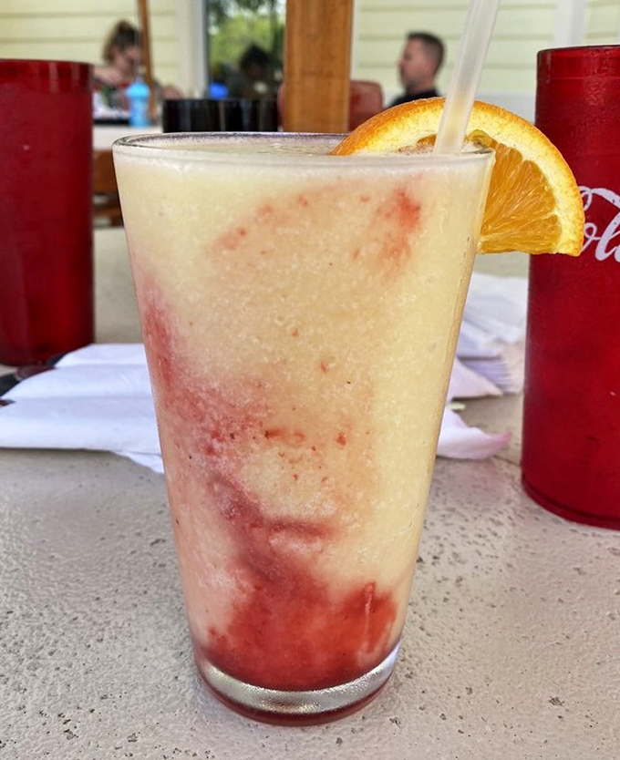 Florida in a glass&mdash;this sunset-colored daiquiri delivers tropical vibes with each sip. Brain freeze never looked so Instagram-worthy.