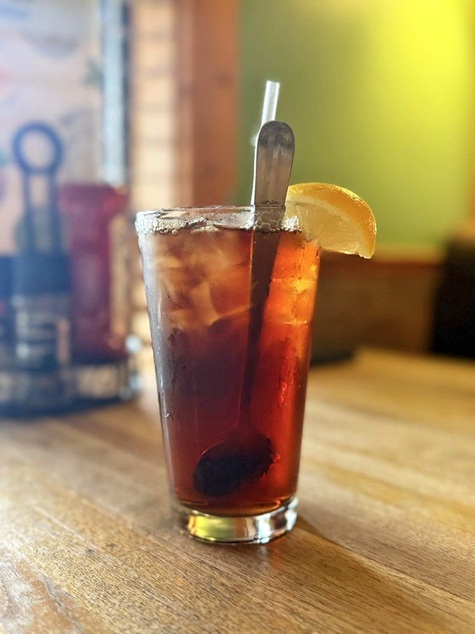That iced tea isn't just a beverage – it's Texas air conditioning in a glass, complete with the obligatory lemon slice hat.