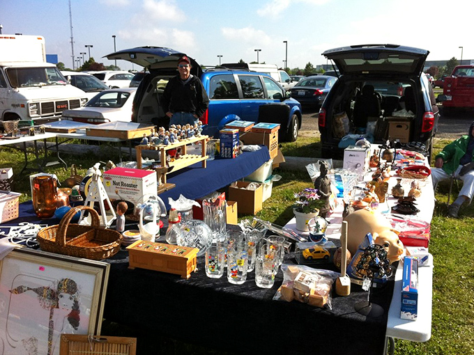 Morning light illuminates treasures and trinkets while vendors arrange their wares&mdash;the calm before the bargain-hunting storm.