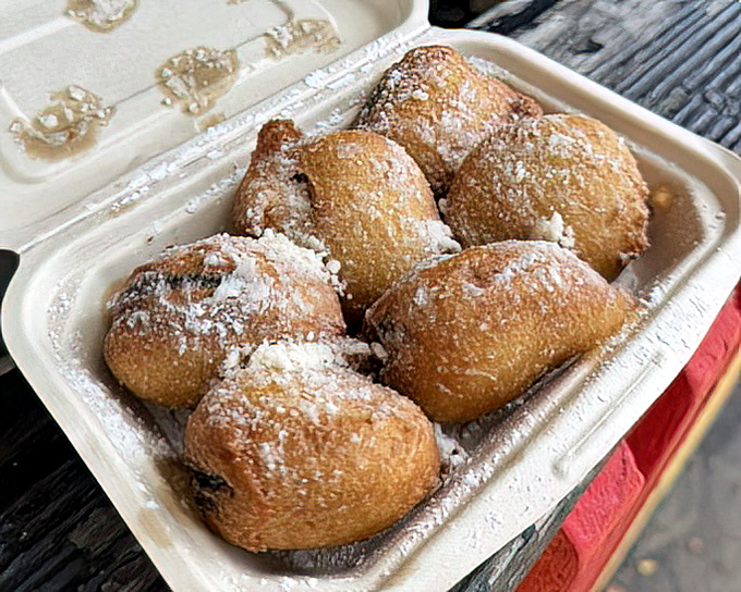 Deep-fried Oreos: Because sometimes cookies need to dress up in their formal wear&mdash;a golden, crispy batter dusted with powdered sugar.