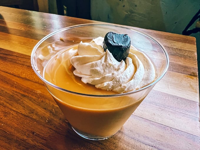 Key lime pudding with a chocolate heart &ndash; because after conquering a seafood mountain, your sweet tooth deserves its own victory dance.