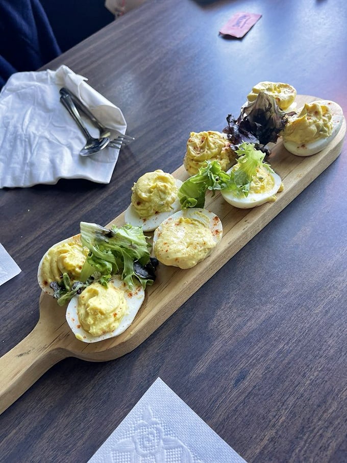 Deviled eggs presented with the kind of care usually reserved for diamond displays. These protein-packed flavor bombs prove that simplicity, when done right, is culinary genius.