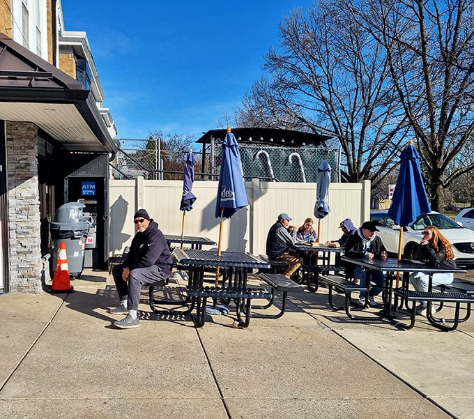 The outdoor picnic tables&mdash;where strangers become friends united by the universal language of exceptional sandwiches.