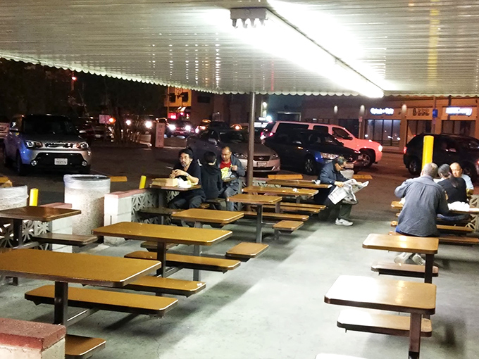 The outdoor dining area &ndash; where strangers become friends united by the universal language of "I can't believe I ate the whole thing."