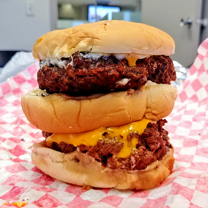 The double cheeseburger: for when one patty simply won't do. This towering beauty is the architectural marvel of the burger world.