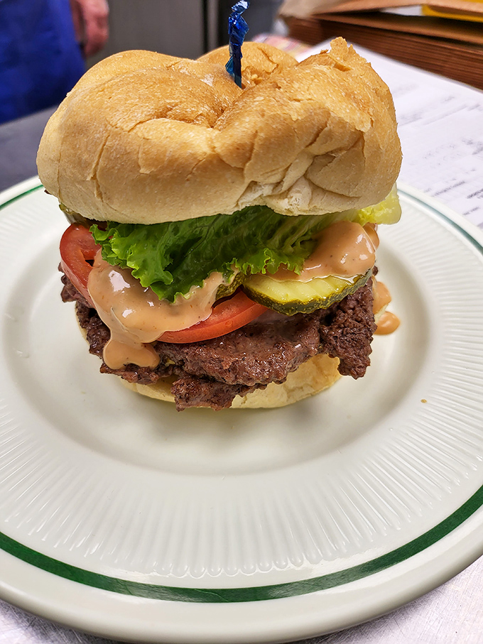 This isn't just a burger&mdash;it's a statement. Half-pound of local beef dressed with enough toppings to require jaw exercises beforehand. 