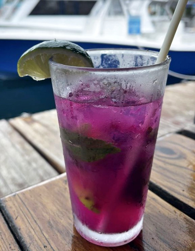 This isn't just a pretty purple drink&mdash;it's vacation in a glass, complete with lime, mint, and the promise of an afternoon nap.