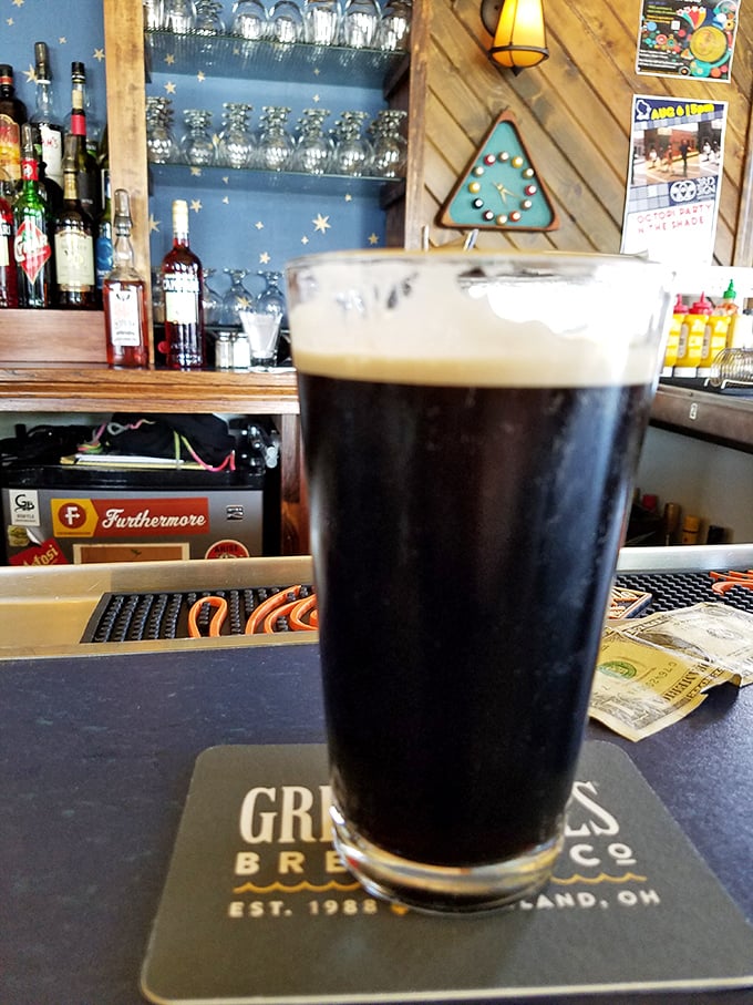 A perfectly poured stout creates its own skyline in the glass, with a creamy head that's practically architectural.