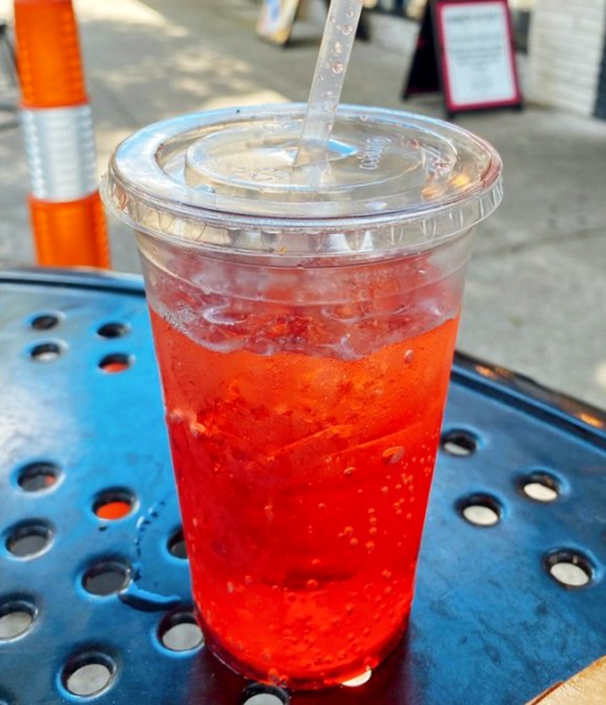A refreshing red soda in the Florida sunshine &ndash; because every great hot dog deserves an equally impressive beverage companion.