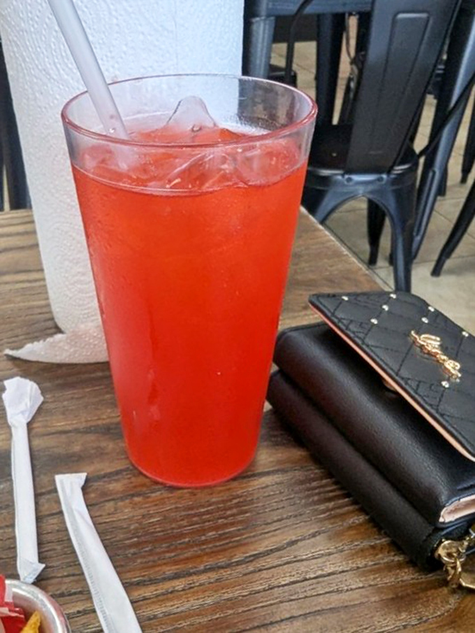 That vibrant red punch isn't just a drink&mdash;it's sweet, cold salvation after committing to the spicier BBQ sauce options.