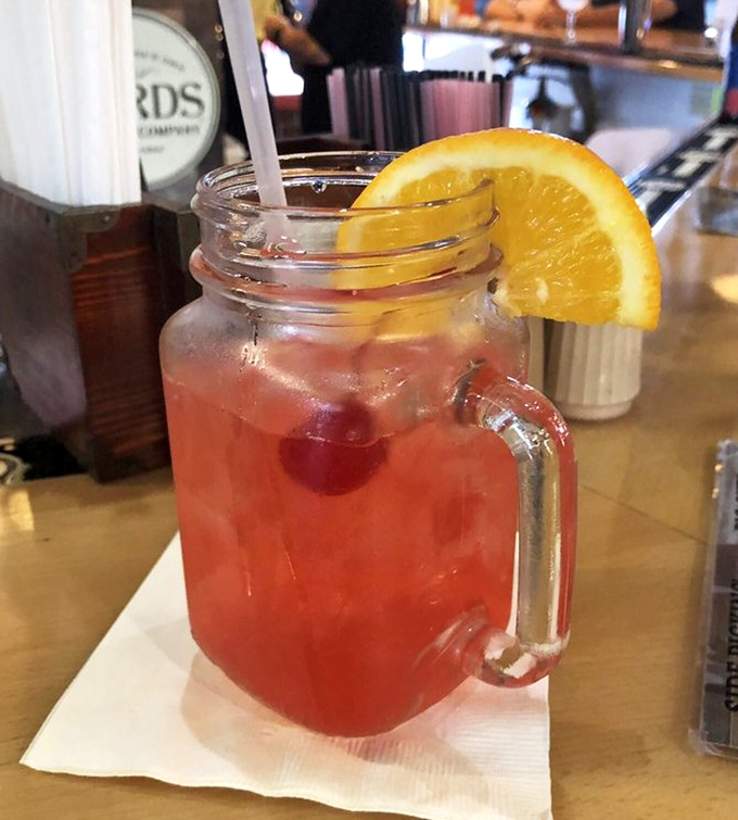 Nothing complements smoky barbecue like a mason jar of sweet tea with enough sugar to make your dentist wince. Southern comfort in liquid form.