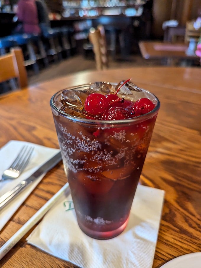 A classic soda with cherries on top&mdash;because sometimes the simplest pleasures are the ones that transport you straight back to childhood.