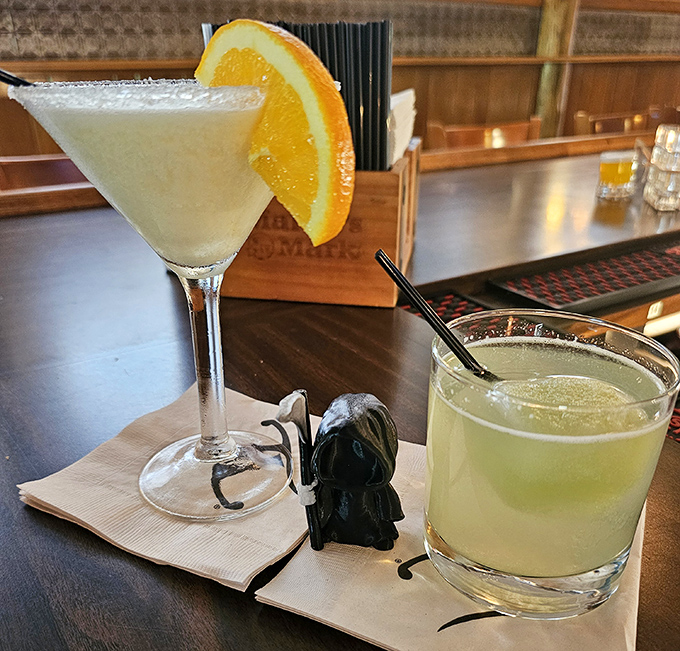 Cocktails that bring vacation vibes to Ohio – where citrus-rimmed glasses and proper garnishes remind you that sophistication and steakhouses go hand in hand.