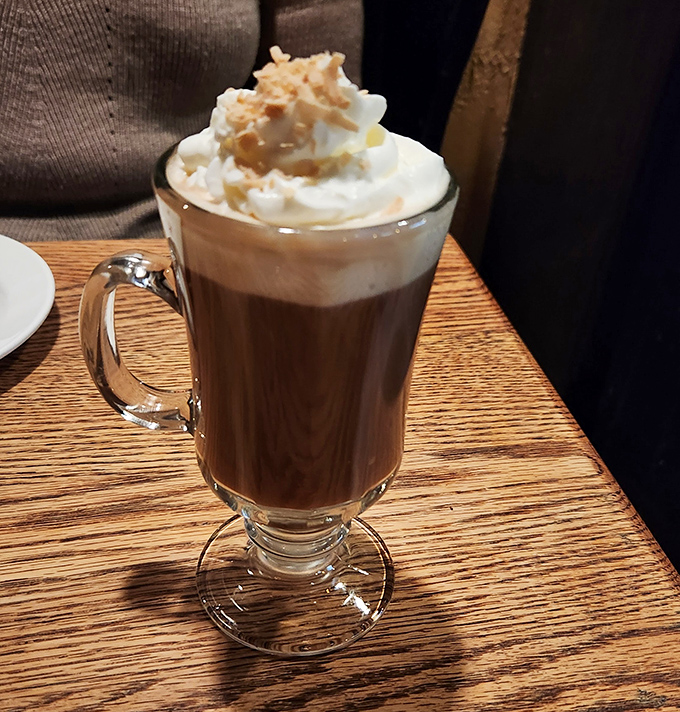 Their hot toddy isn't just a drink&mdash;it's a warm hug in a glass, topped with whipped cream that melts into the richness below.