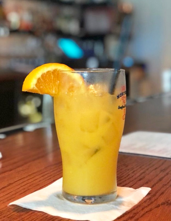 This sunshine-in-a-glass orange cocktail doesn't just complement seafood&mdash;it transports you straight to vacation mode with one sip.