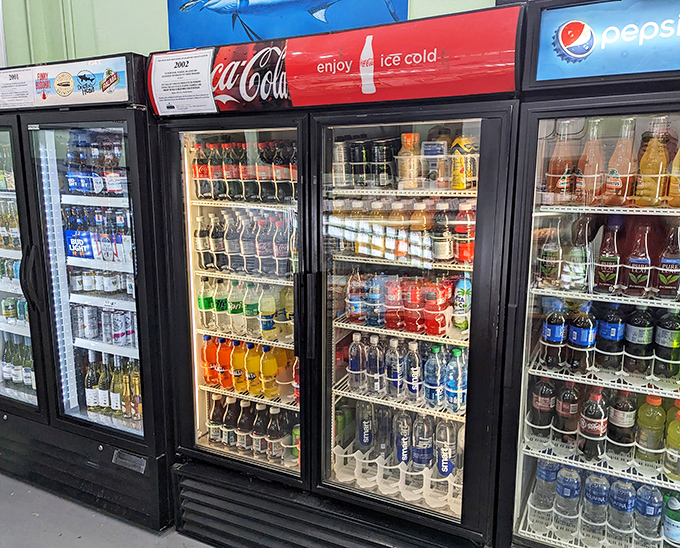 Even the beverage selection is serious business here. Because nothing complements seafood like the satisfying crack of a cold drink.