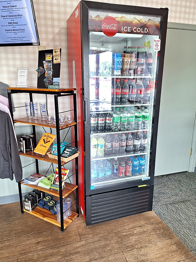 The beverage cooler stands sentinel, offering the perfect companions to wash down your pasty. Because even perfection needs something to help it slide down. 