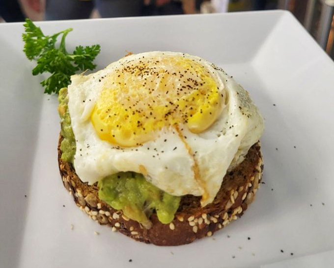 Avocado toast gets a gourmet upgrade with a perfectly cooked egg on top. Millennials didn't invent it, but Bread Pete perfected it.