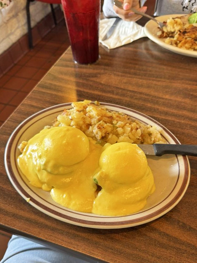 Eggs Benedict executed with the kind of precision that would make Julia Child nod approvingly.