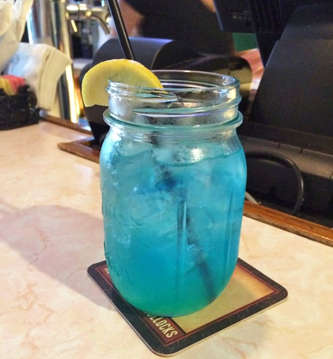 Electric blue lemonade in a mason jar&mdash;because sometimes you need something fun to wash down all that serious barbecue. The lemon slice adds a touch of citrus sunshine.