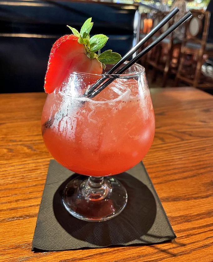 This isn't just a cocktail&mdash;it's summer in a glass. Garnished with fresh strawberry and mint, it's the kind of drink that demands a sunset view.