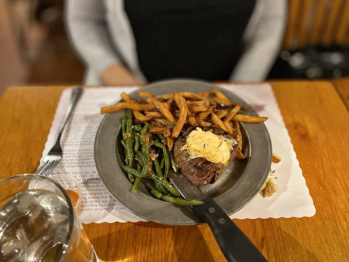 Filet mignon with a pat of butter slowly melting into beefy perfection, paired with green beans and fries that aren't just sides&mdash;they're supporting actors deserving their own award.