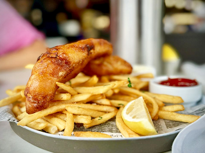 Fish and chips that could make a British pub-goer weep with joy. Golden-battered perfection with fries that deserve equal billing.