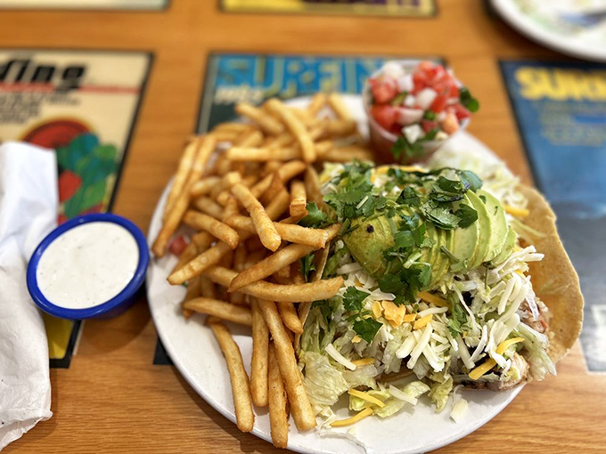 Even lunch gets the California treatment with fresh fish tacos that would make coastal Mexico proud, served with perfectly golden fries.