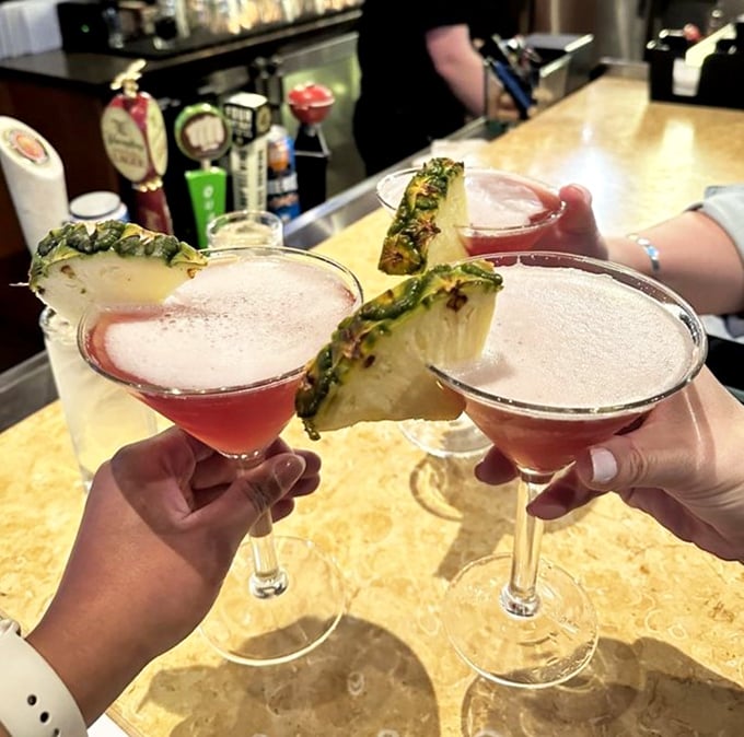 Cocktails that look this good should come with a warning label. These fruit-garnished martinis prove that visual appeal is just the opening act.