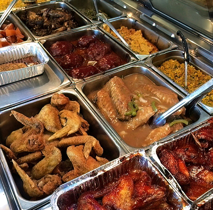The buffet of champions. Each metal tray contains a different path to happiness, with those wings calling my name the loudest.