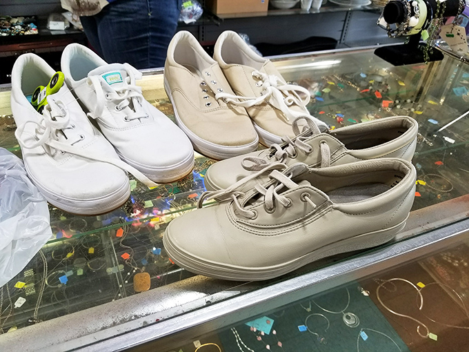 White sneakers lined up like hopeful contestants at a talent show&mdash;barely worn and ready for their second act.